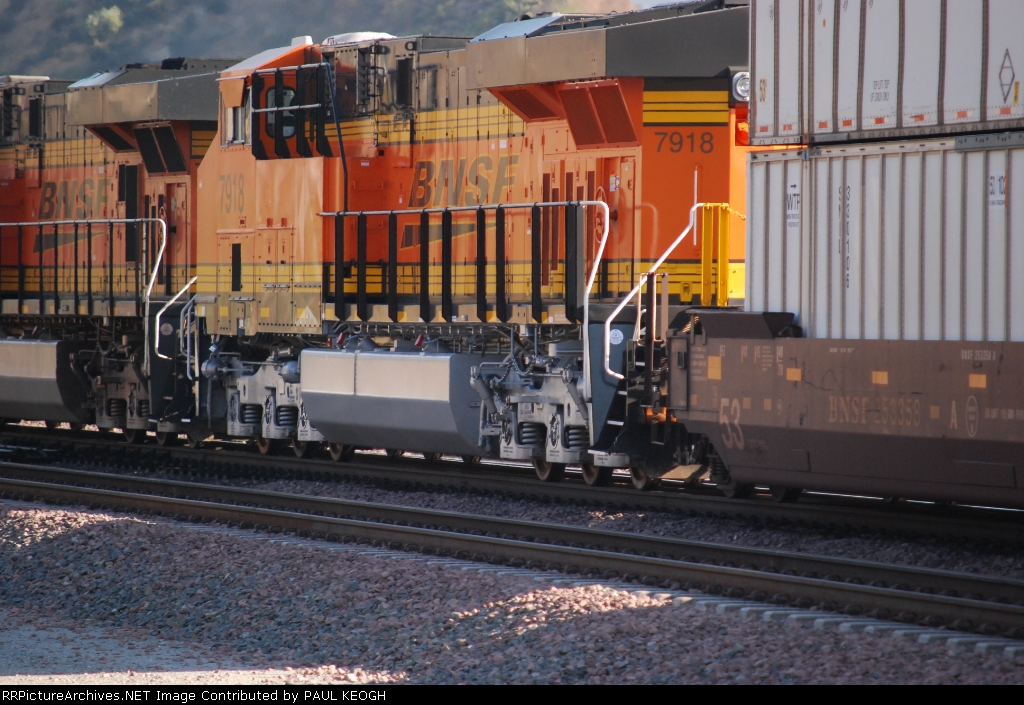 BNSF 7918 starts to pick up the speed as she rolls west with a Z.